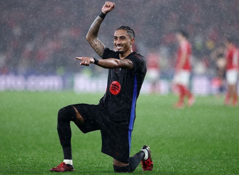 Soccer-Raphinha strike earns Barca 5-4 win at Benfica and place in last ...