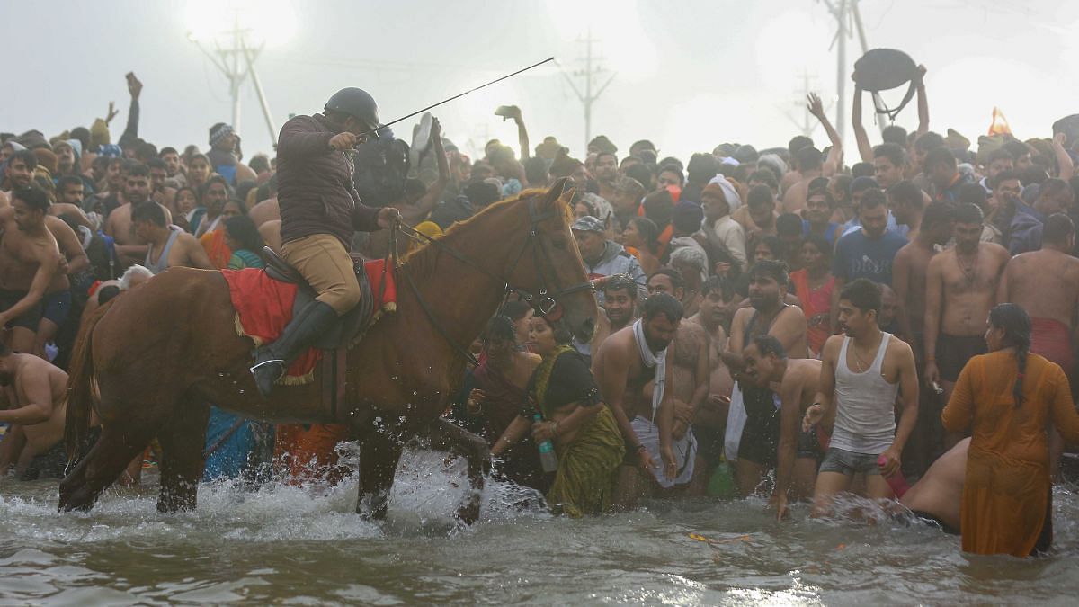 Brief chaos at Mahakumbh as devotees breach area barricaded for 13 ... Brief chaos at Mahakumbh as devotees breach area barricaded for 13 ...